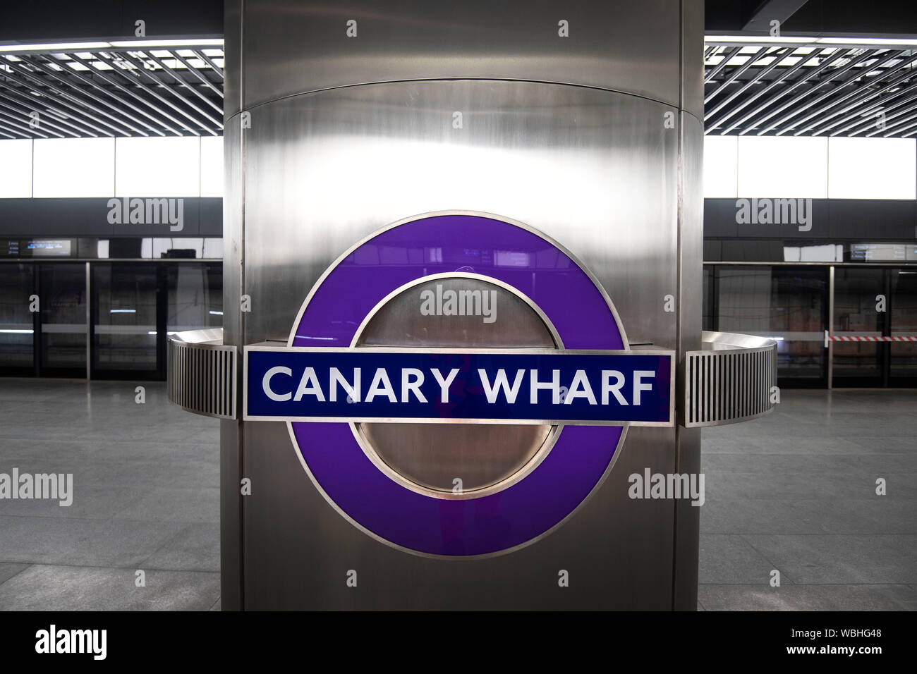 Canary Wharf signage in place on the platform of the new Elizabeth Line ...