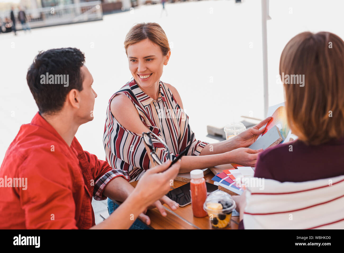 Designers fitting the materials for their new concept Stock Photo - Alamy