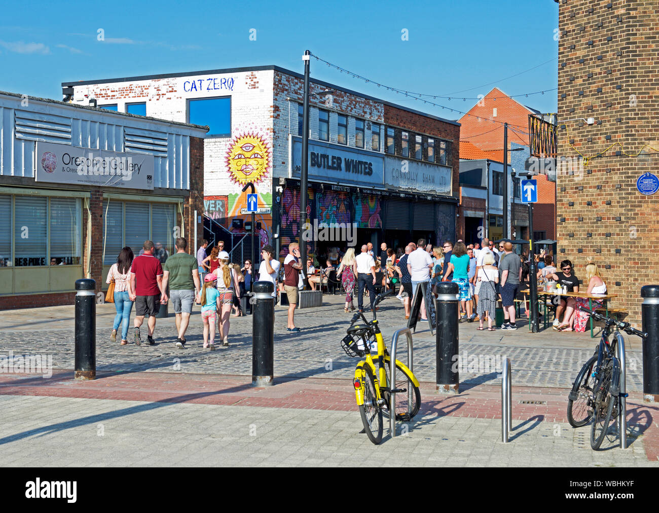People gathering in Humber Street, with many trendy shops and bars ...