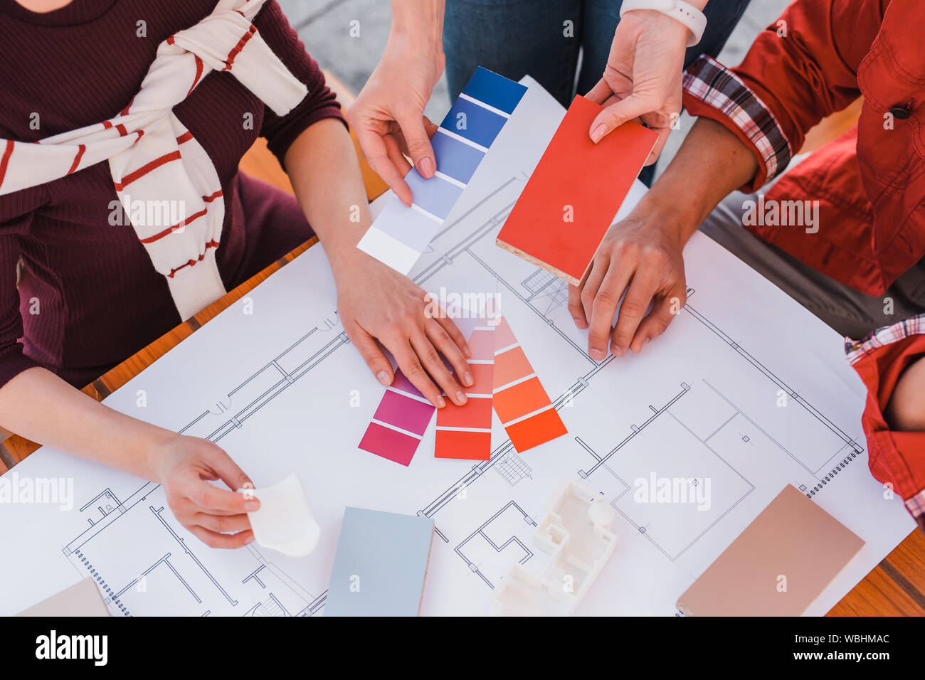 Designers creating plan and color palette for their project Stock Photo ...