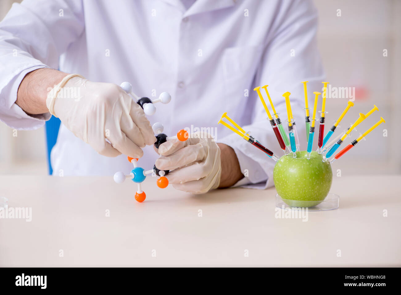 The male nutrition expert testing food products in lab Stock Photo - Alamy