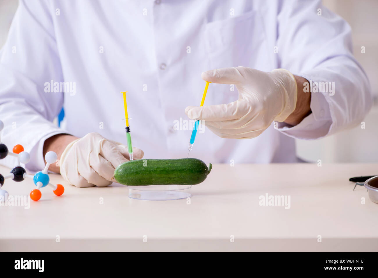 The male nutrition expert testing food products in lab Stock Photo - Alamy