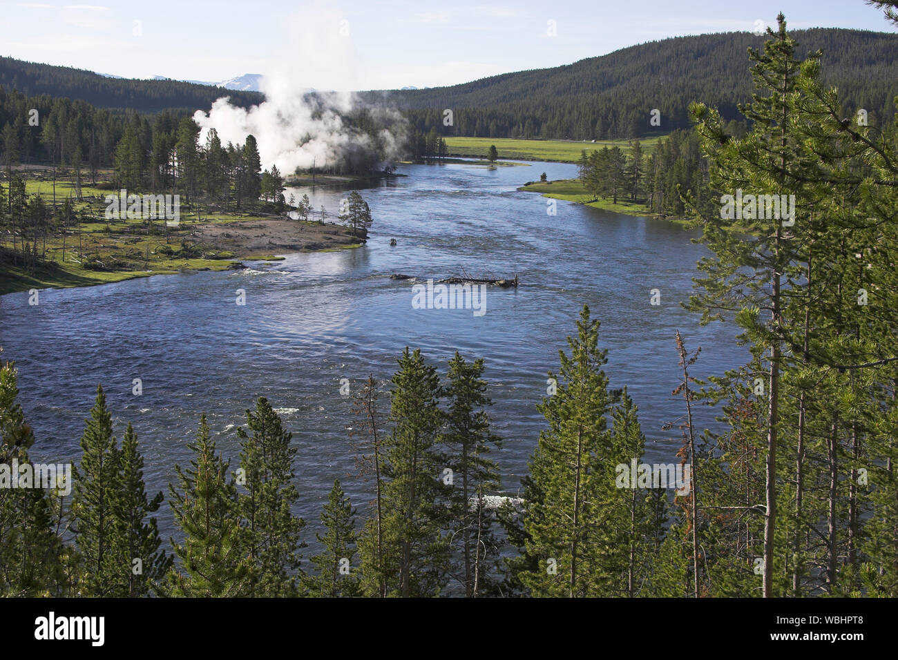 Steam rising from geothermal activity Yellowstone River in the upper ...
