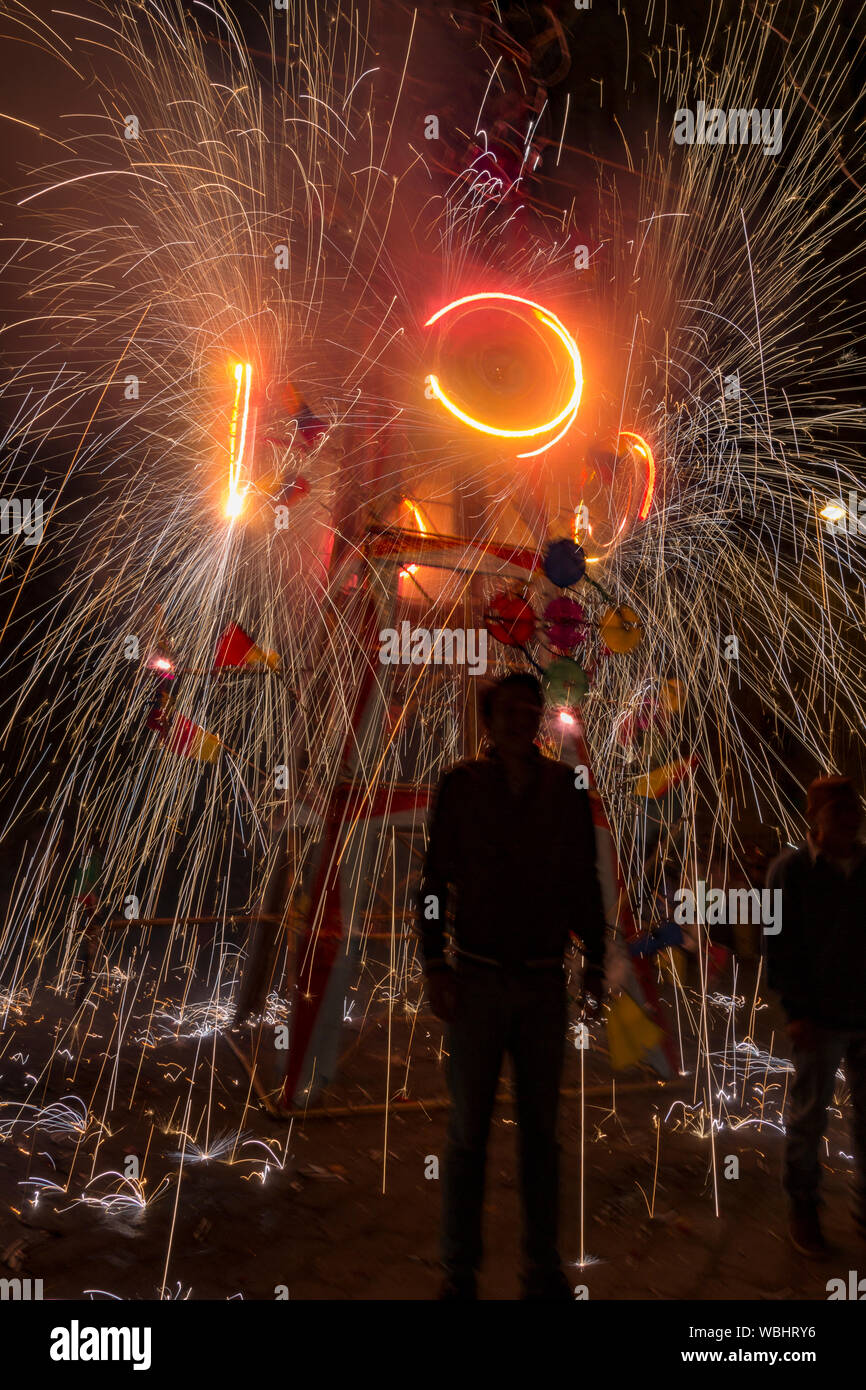 Castles are made with bamboo structures, fire cracker strings, many ...