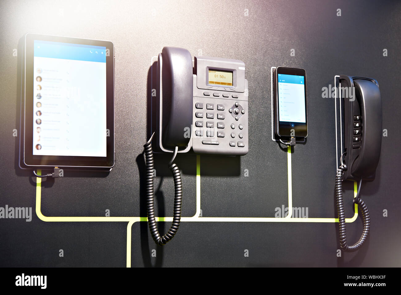 Office telephones and modern smartphones and tablets on the web Stock ...