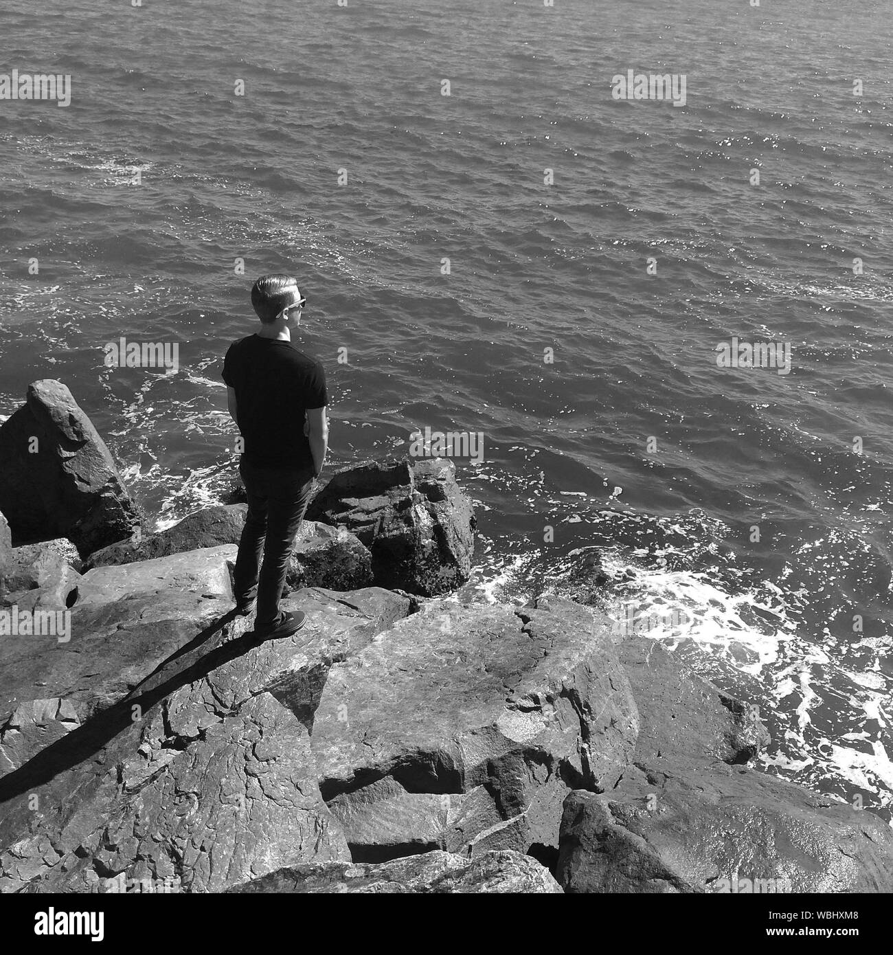 Man standing top angle Black and White Stock Photos & Images - Alamy