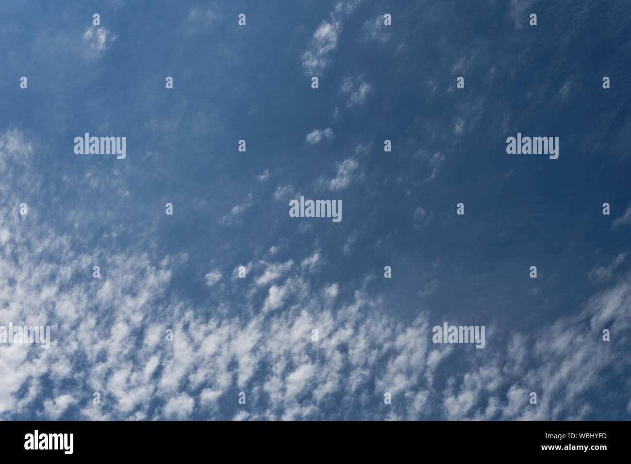 Blue sky background with white clouds. Beautiful nature wallpaper for background Stock Photo - Alamy