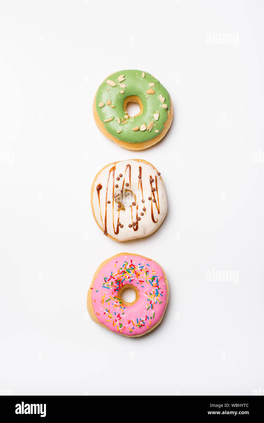 Fresh sweet bonuts on white studio background Stock Photo - Alamy