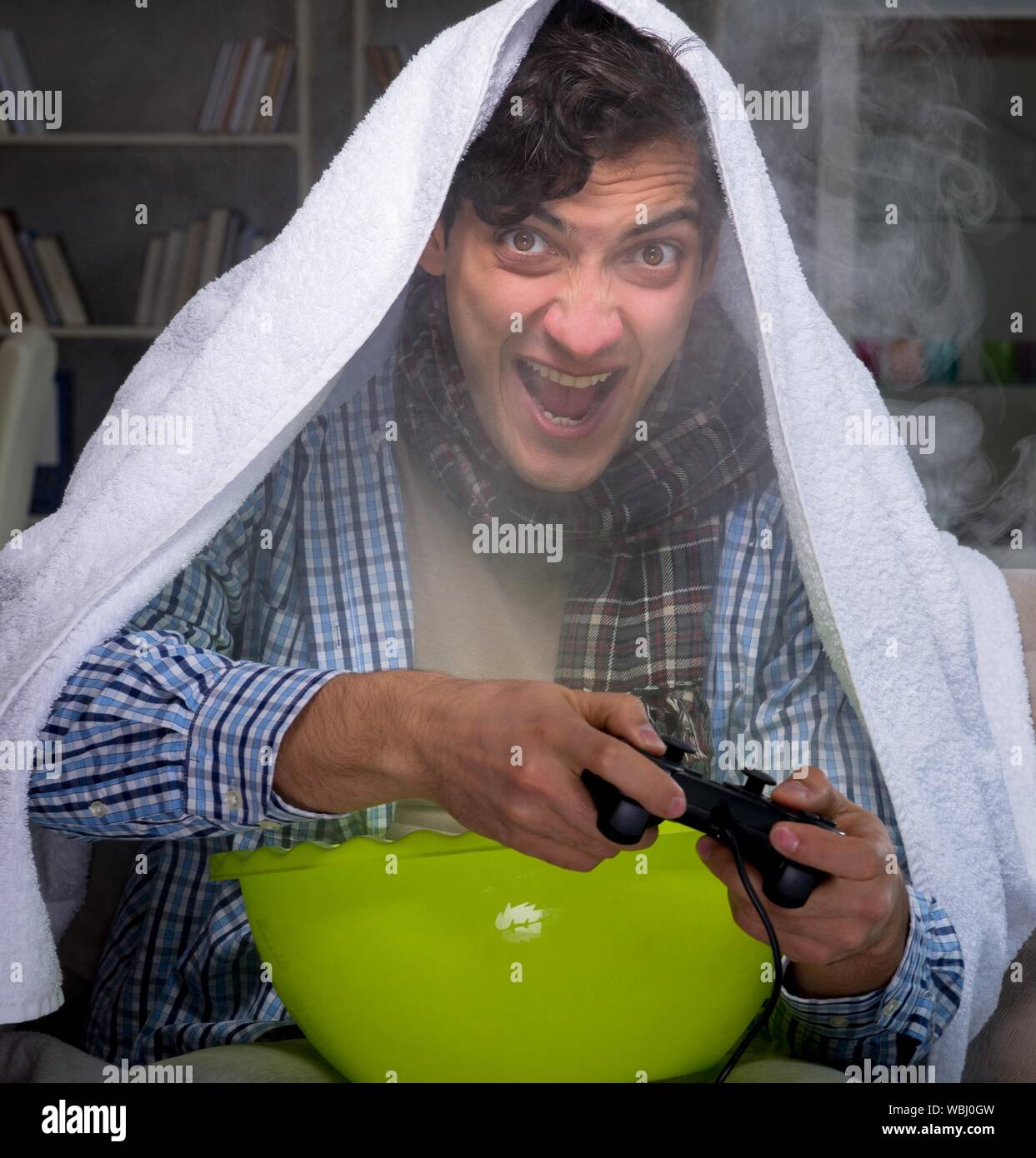 The sick man doing inhalation at night in home Stock Photo - Alamy