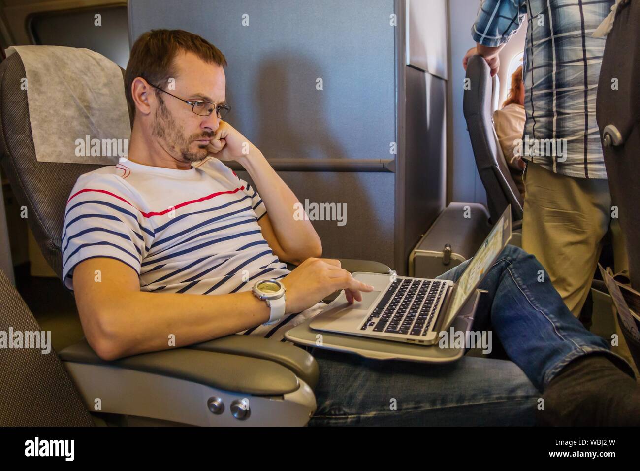 Airplane laptop hi-res stock photography and images - Alamy