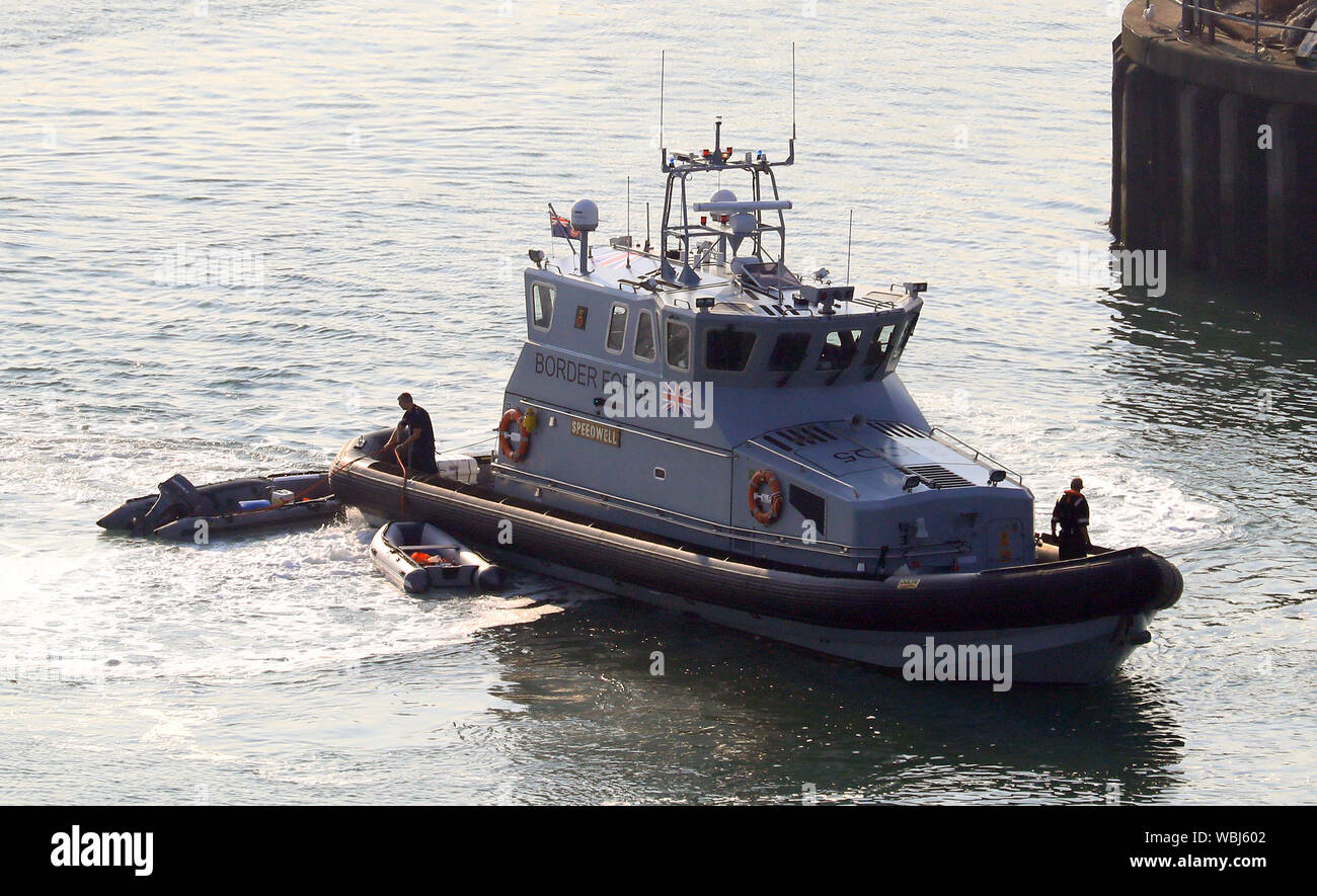Small boats containing suspected migrant hi-res stock photography and ...