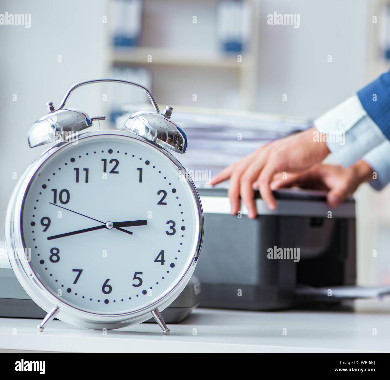 The businessman making copies in copying machine Stock Photo - Alamy