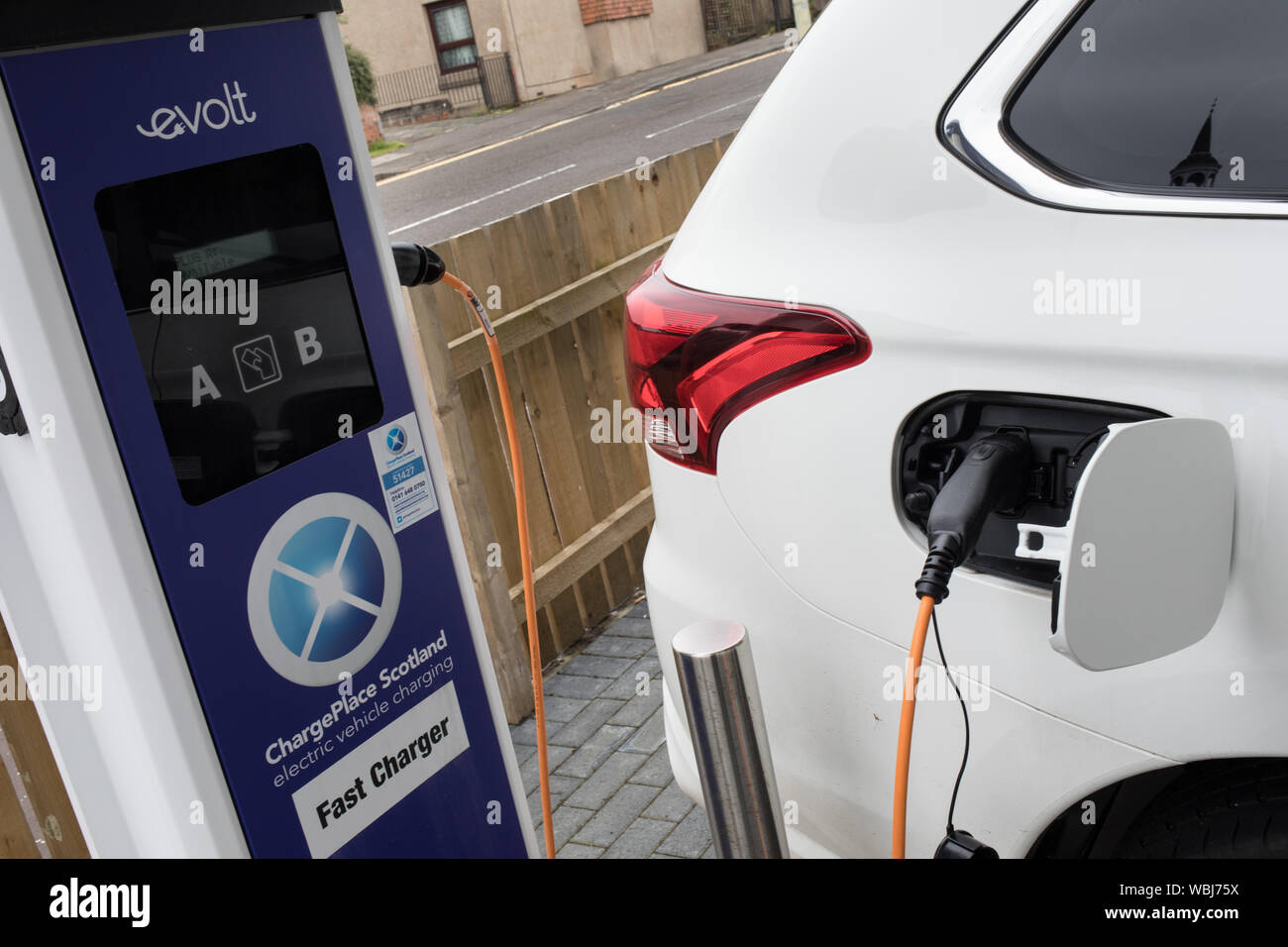 Drivers charge their Electric and Hybrid vehicles at the Princes Street ...