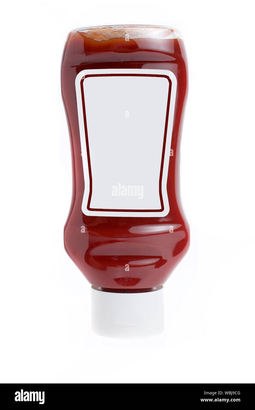 Blank label tomato ketchup glass bottle upside down on white background ...