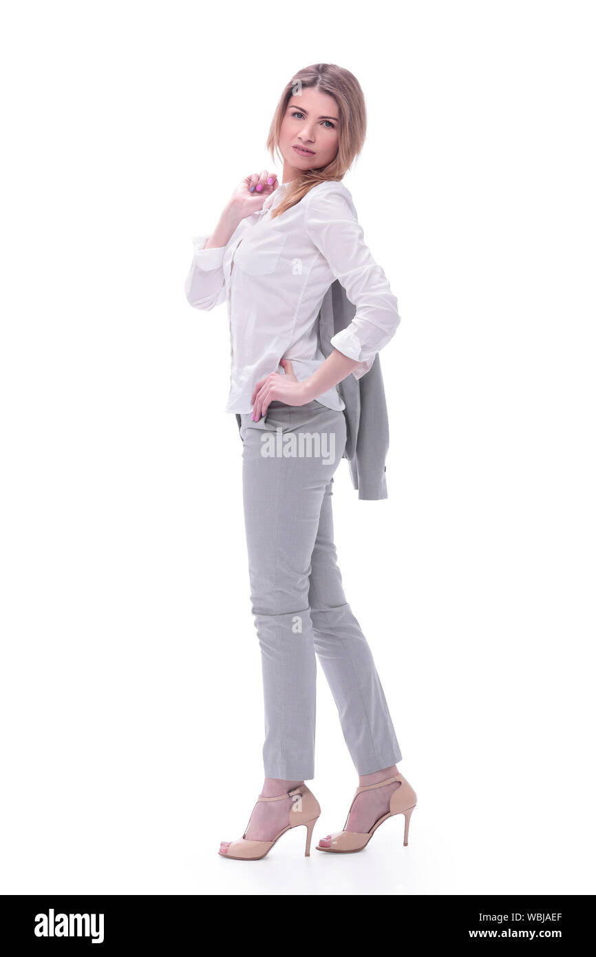 young business woman with a jacket over her shoulder. isolated on white ...