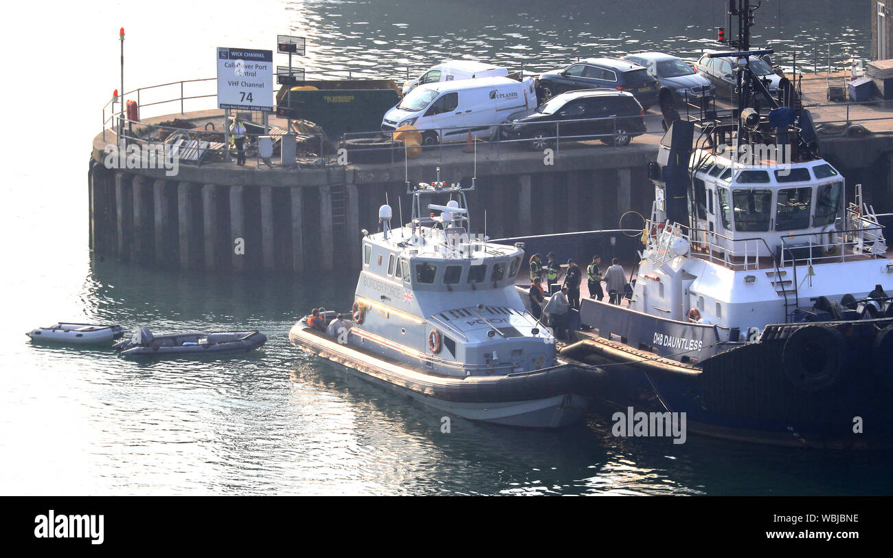 Small boats containing suspected migrant hi-res stock photography and ...