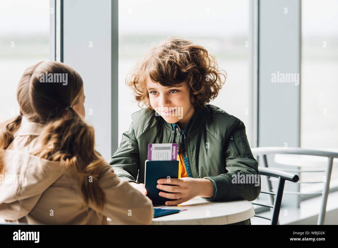 Boy with travel ticket hi-res stock photography and images - Alamy