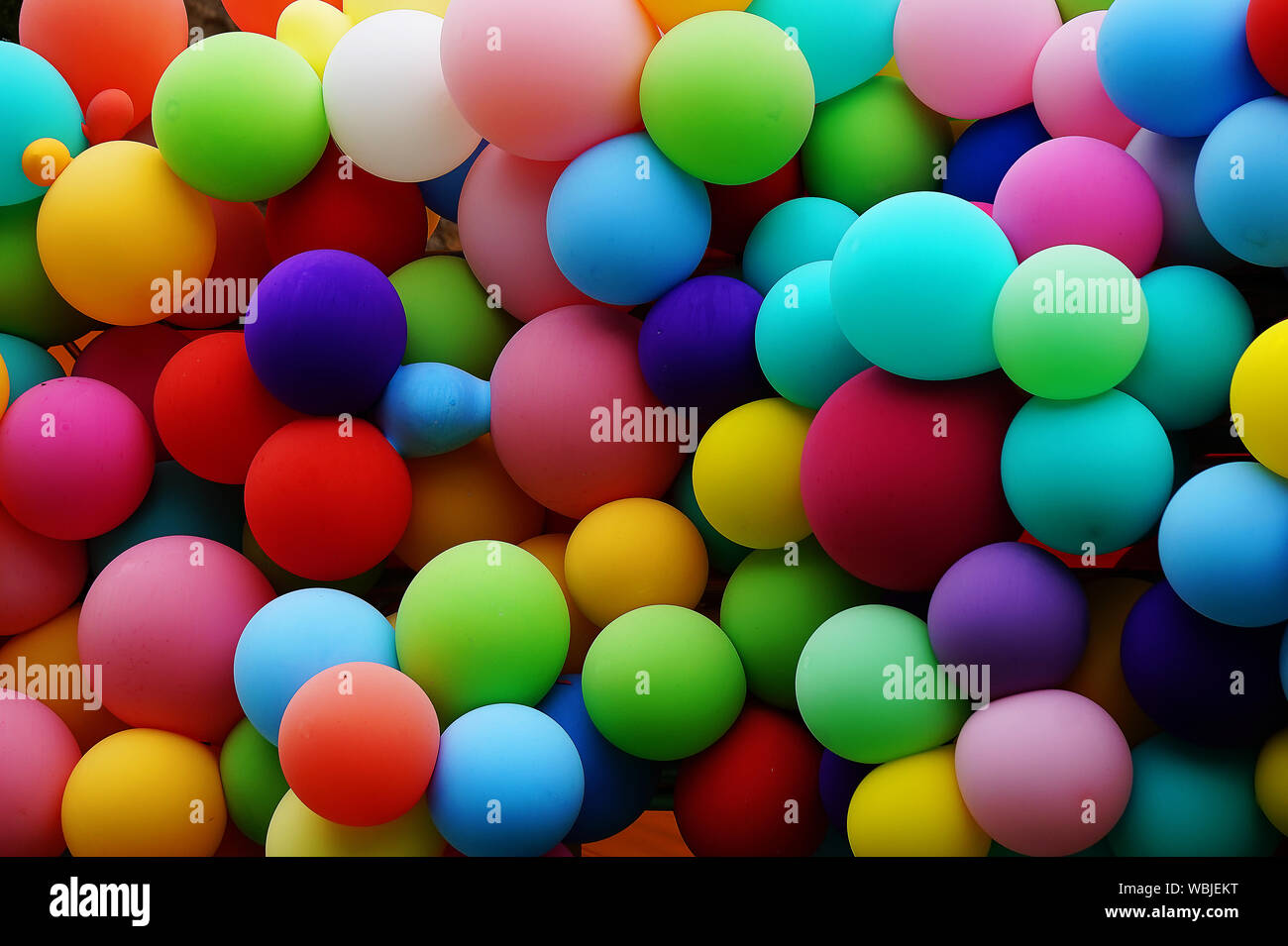 Bright balloons of different sizes and colors Stock Photo - Alamy