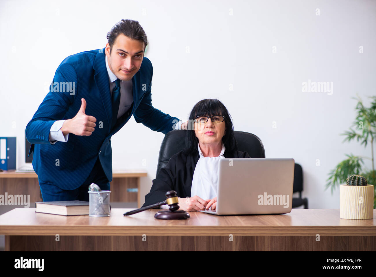 Female judge working in courtroom hi-res stock photography and images ...