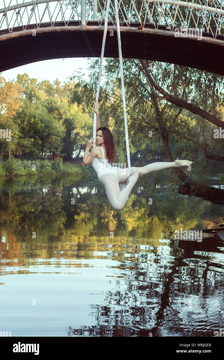 Aerial silk performer acrobatic acrobatics hi-res stock photography and ...