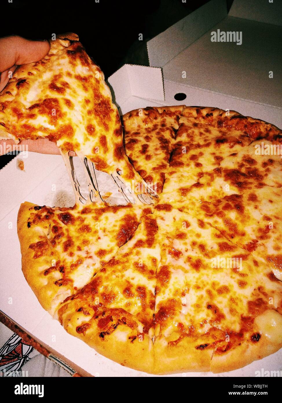 Pizza Slice Hand High Resolution Stock Photography and Images - Alamy