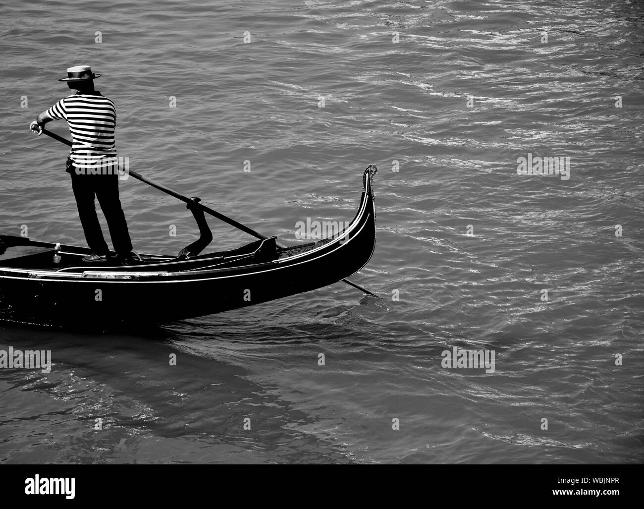 Rowing his gondola hi-res stock photography and images - Alamy