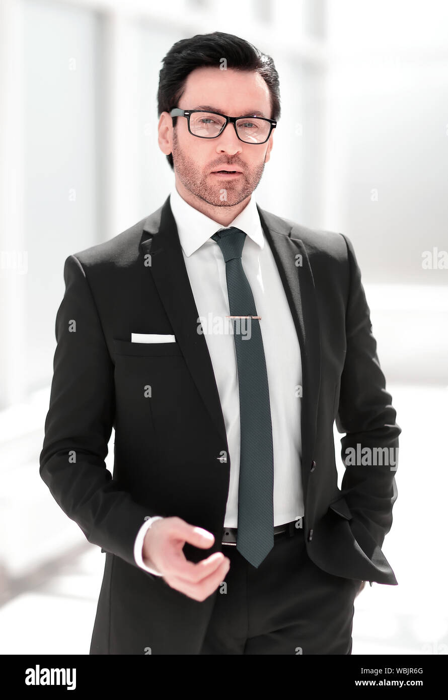 beautiful businessman in the office background Stock Photo - Alamy