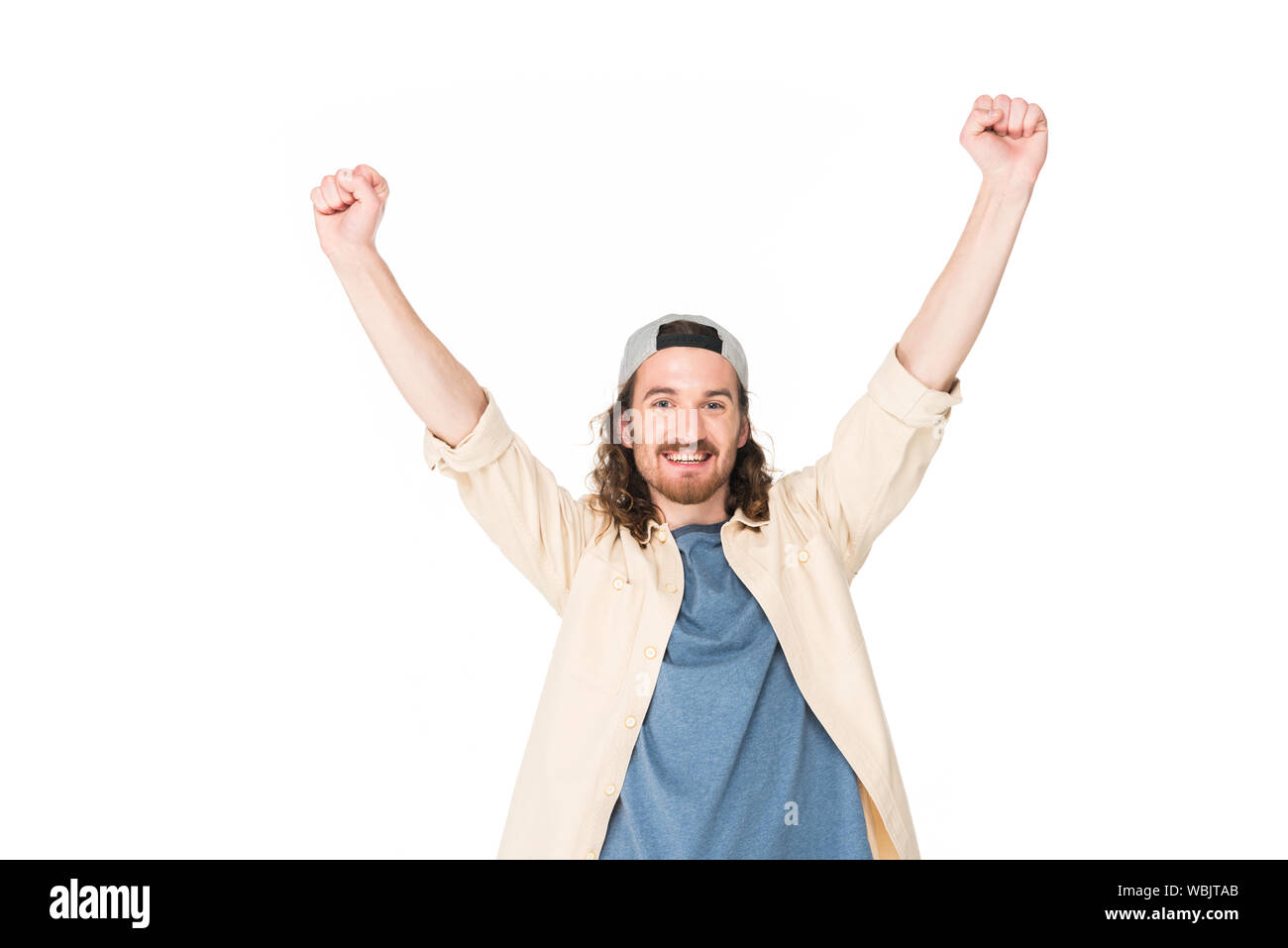excited young man raising hands in air isolated on white Stock Photo ...