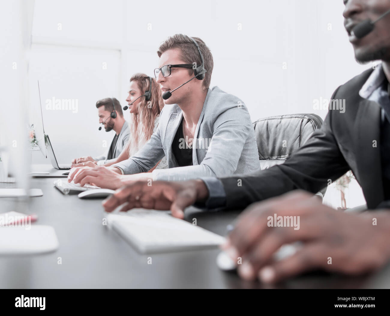call center staff work in a modern office Stock Photo - Alamy