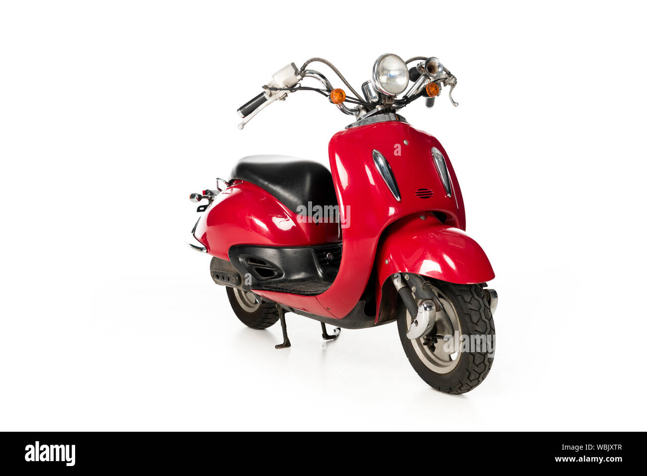 clean, new, red scooter isolated on white Stock Photo - Alamy