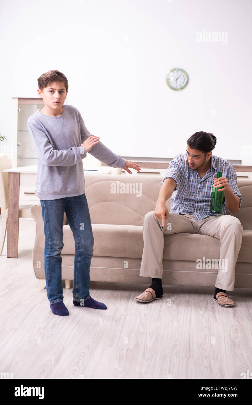 The drunk father and his son Stock Photo - Alamy