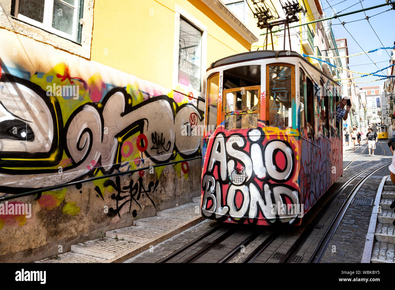 Graffiti coverd funicular tram, Lisbon, Portugal Stock Photo - Alamy