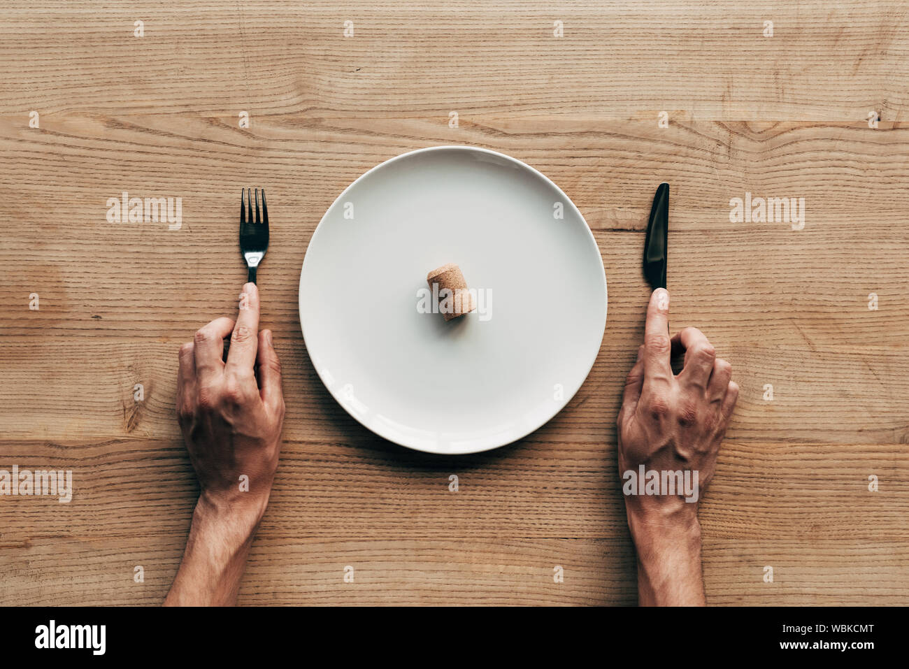 Man knife and fork and plate hi-res stock photography and images - Alamy