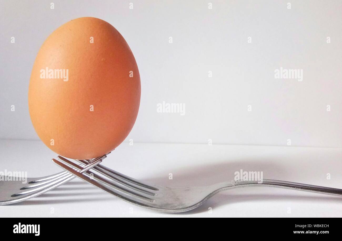 Fork and egg balancing hi-res stock photography and images - Alamy
