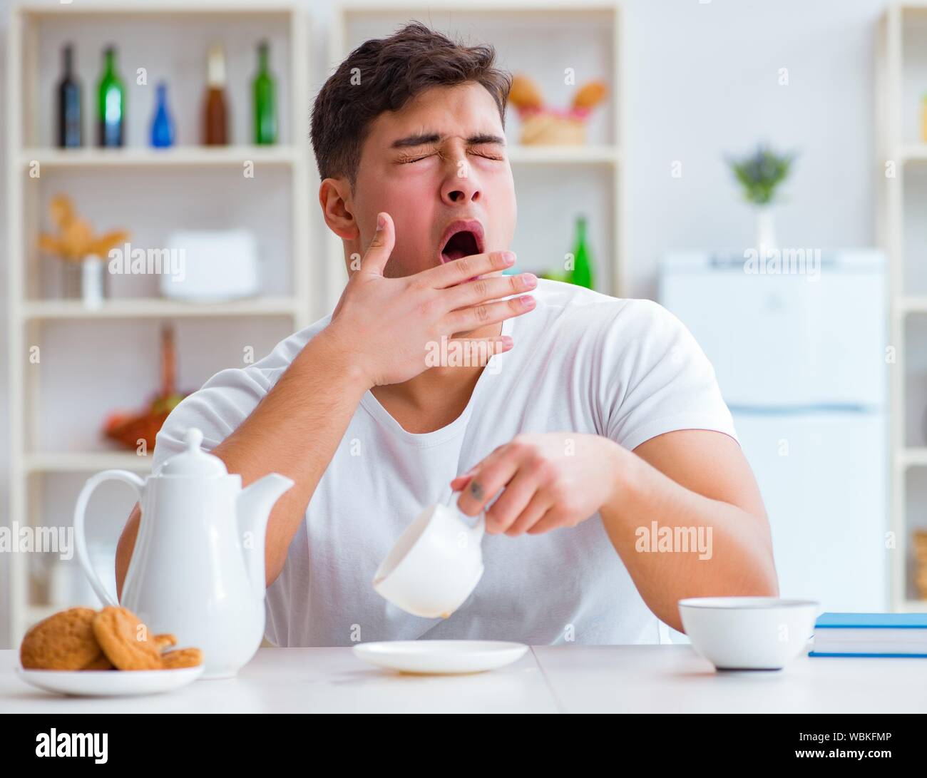 The man falling asleep during his breakfast after overtime work Stock ...