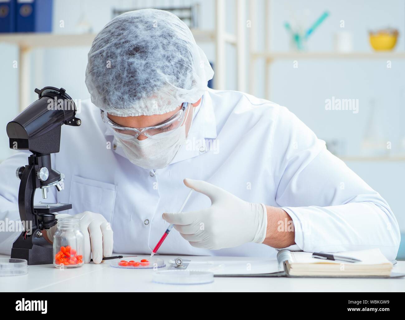 The doctor testing new drugs for medical purposes Stock Photo - Alamy