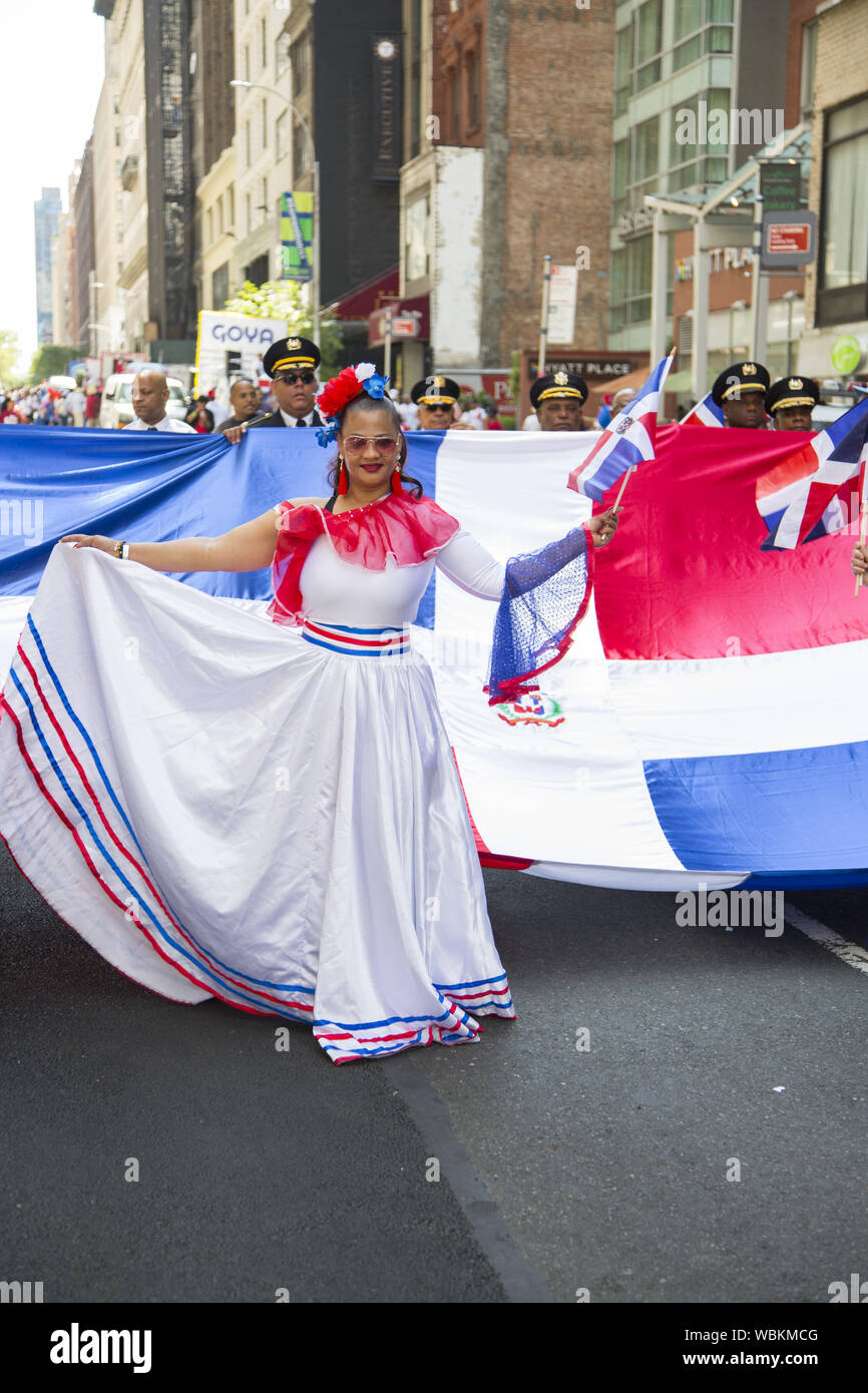 Dancer in traditional folk attire at the Dominican Day Parade along 6th ...