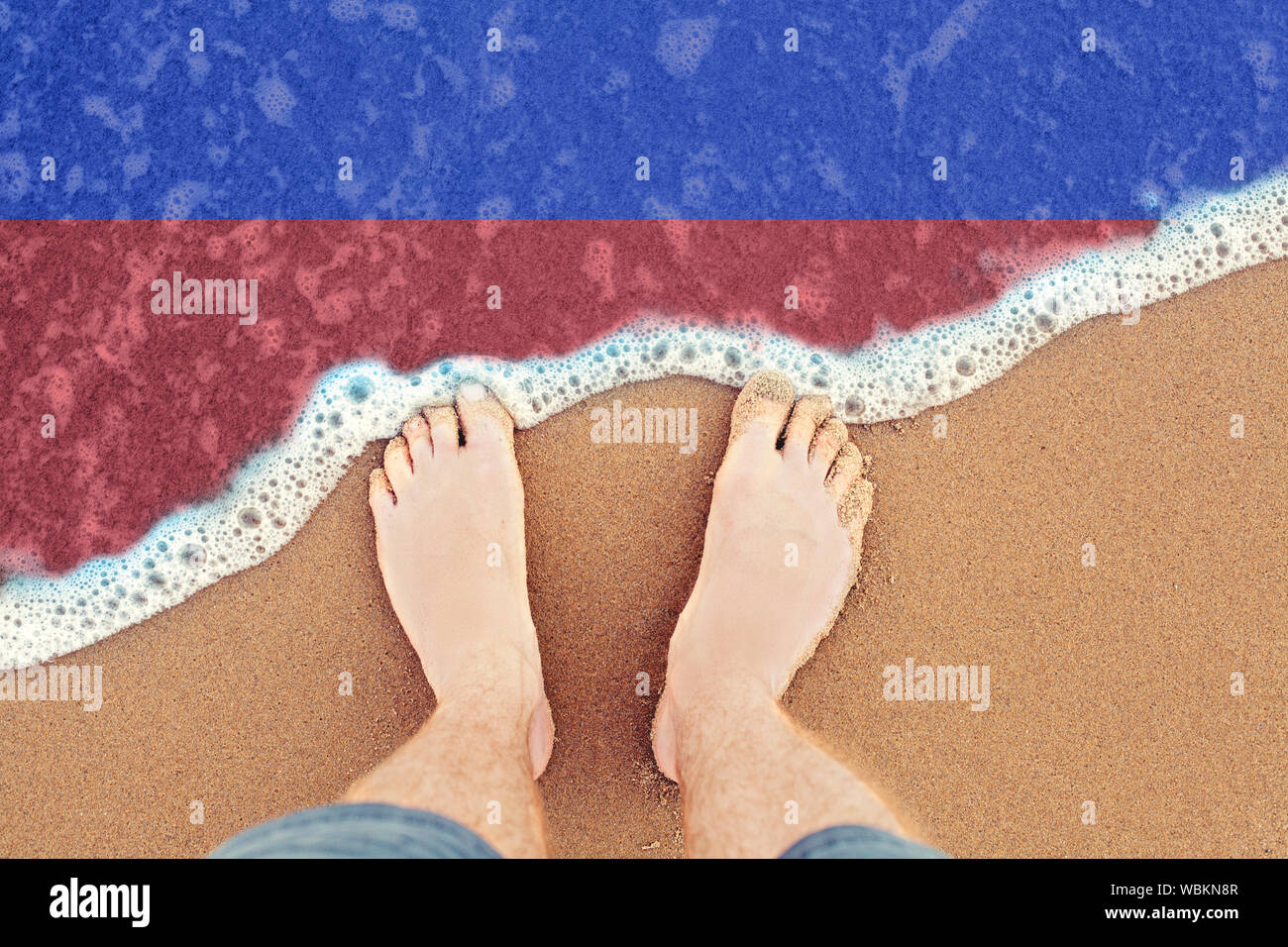 Feet on sandy with flag Haiti. Top View Stock Photo - Alamy