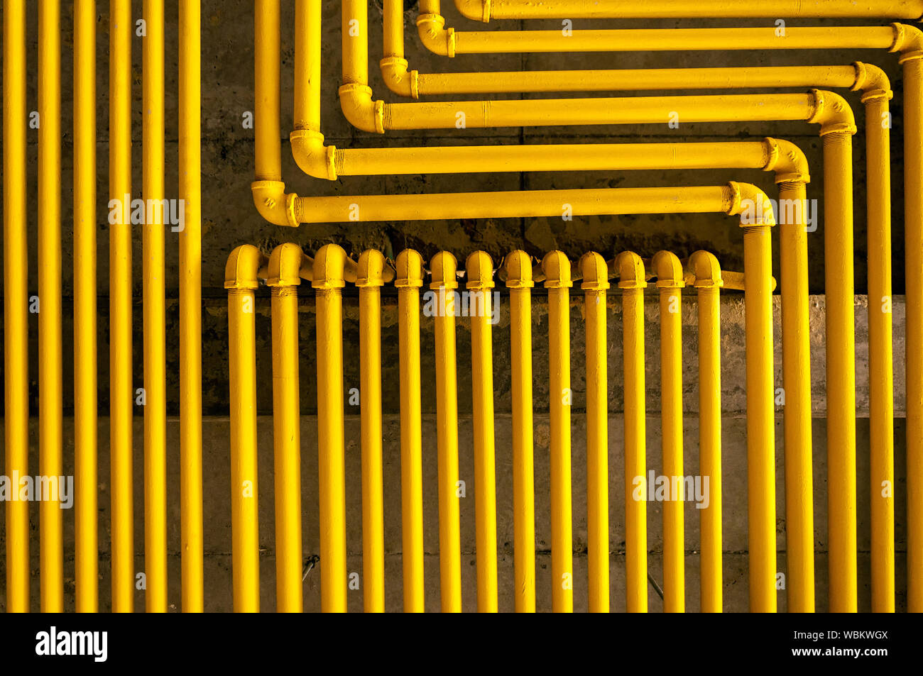 Yellow pipes hi-res stock photography and images - Alamy
