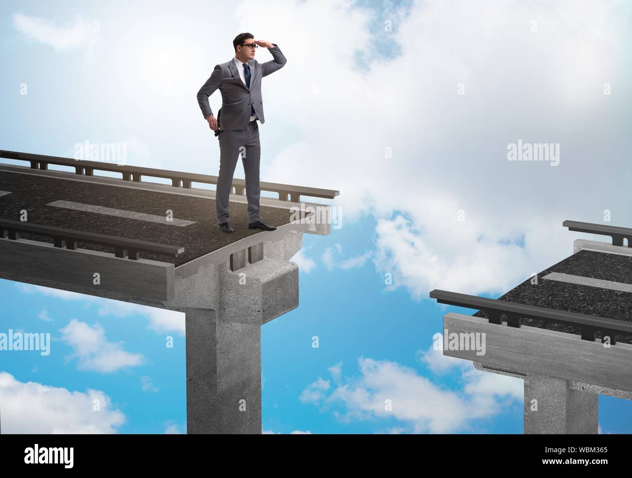 The businessman ready to overcome the broken bridge Stock Photo - Alamy