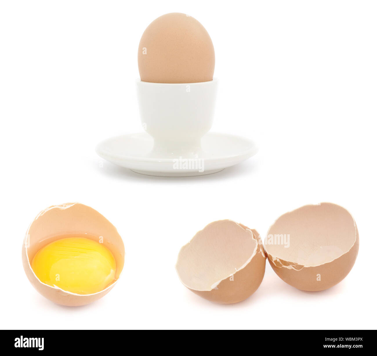 Eggs. Boiled and raw eggs with empty shell Stock Photo - Alamy