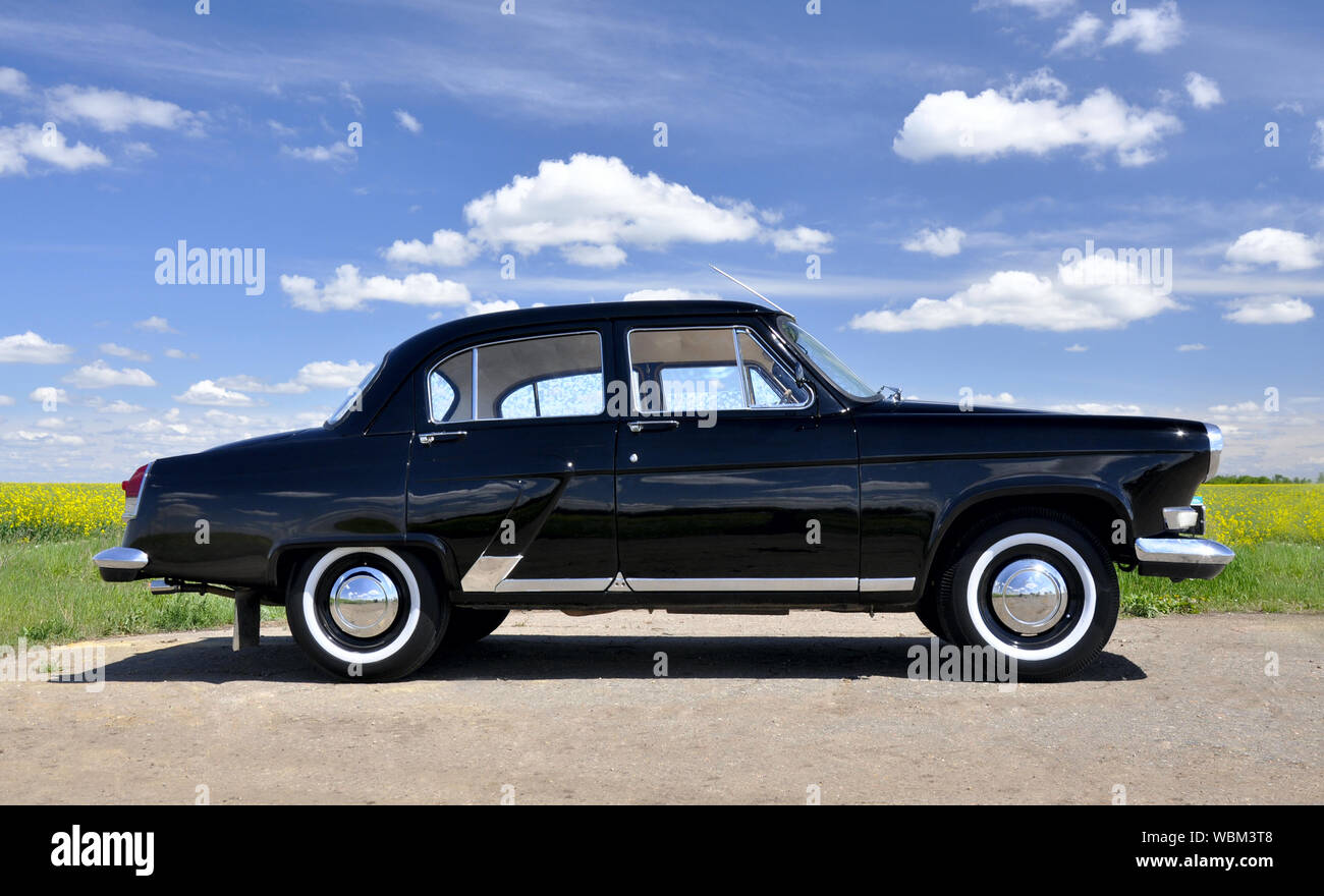 Old vintage black car. Side view. GAZ 21 Volga Stock Photo - Alamy