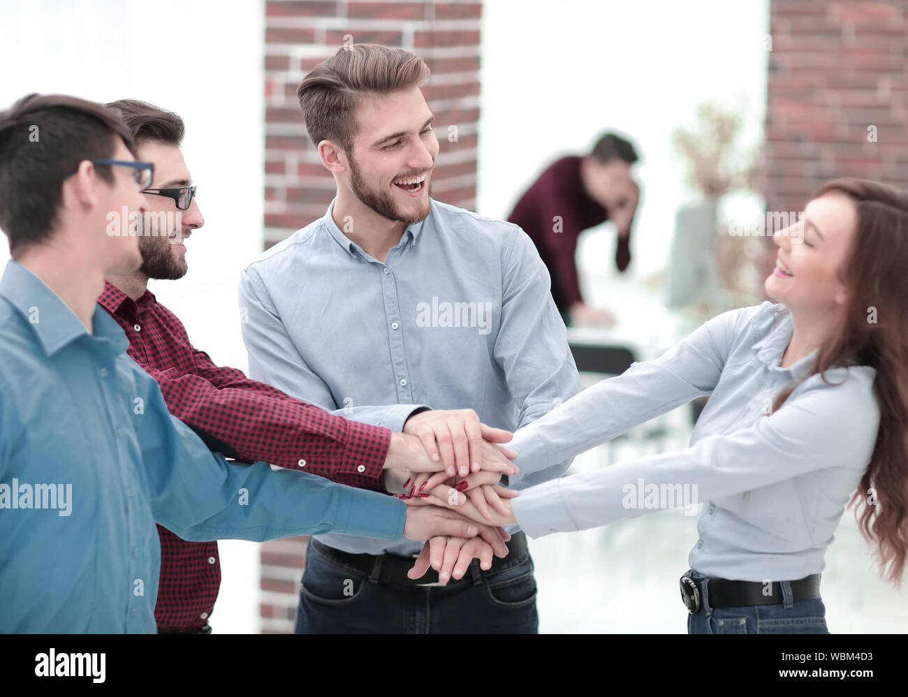 Group of people hands together partnership teamwork Stock Photo - Alamy