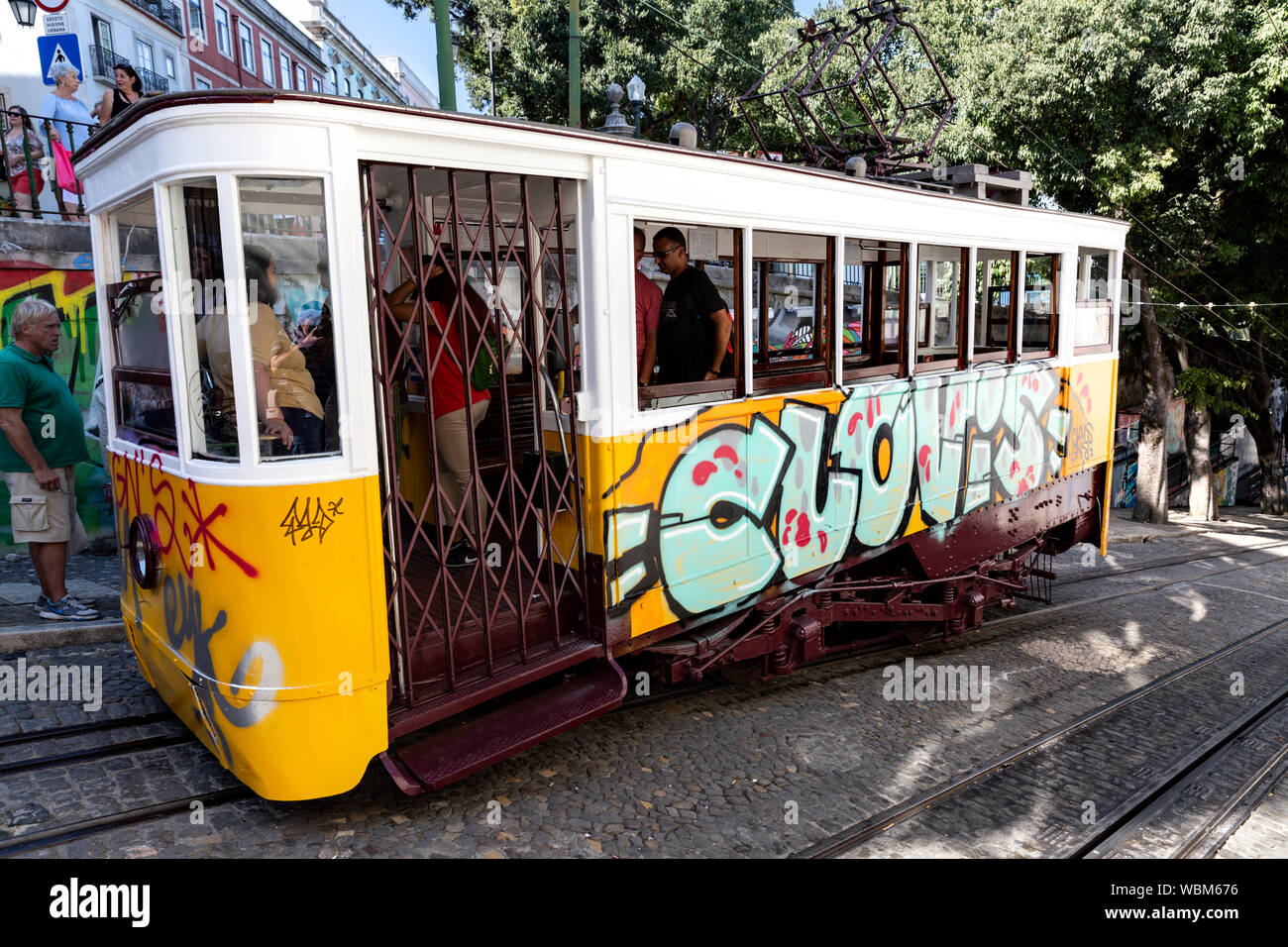 Graffiti coverd funicular tram, Lisbon, Portugal Stock Photo - Alamy