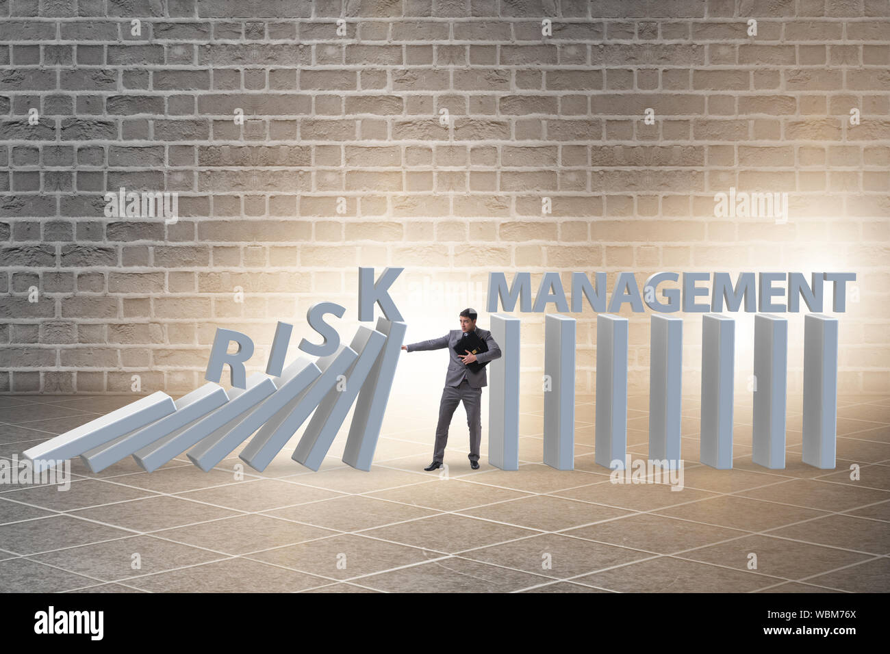 The businessman in risk management concept Stock Photo - Alamy