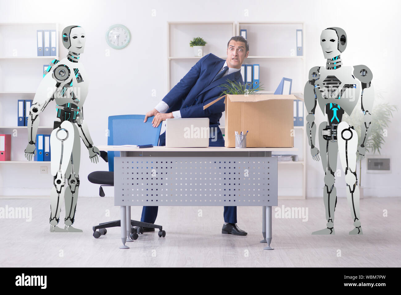 The concept of robots replacing humans in offices Stock Photo - Alamy