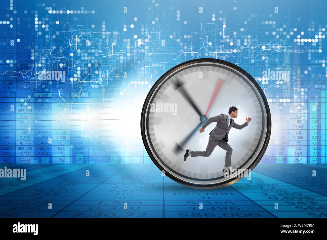 The businessman employee in time management concept Stock Photo - Alamy