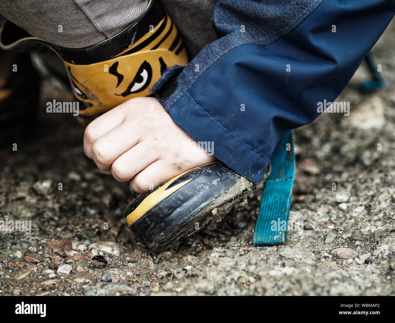 Holding boot hi-res stock photography and images - Alamy