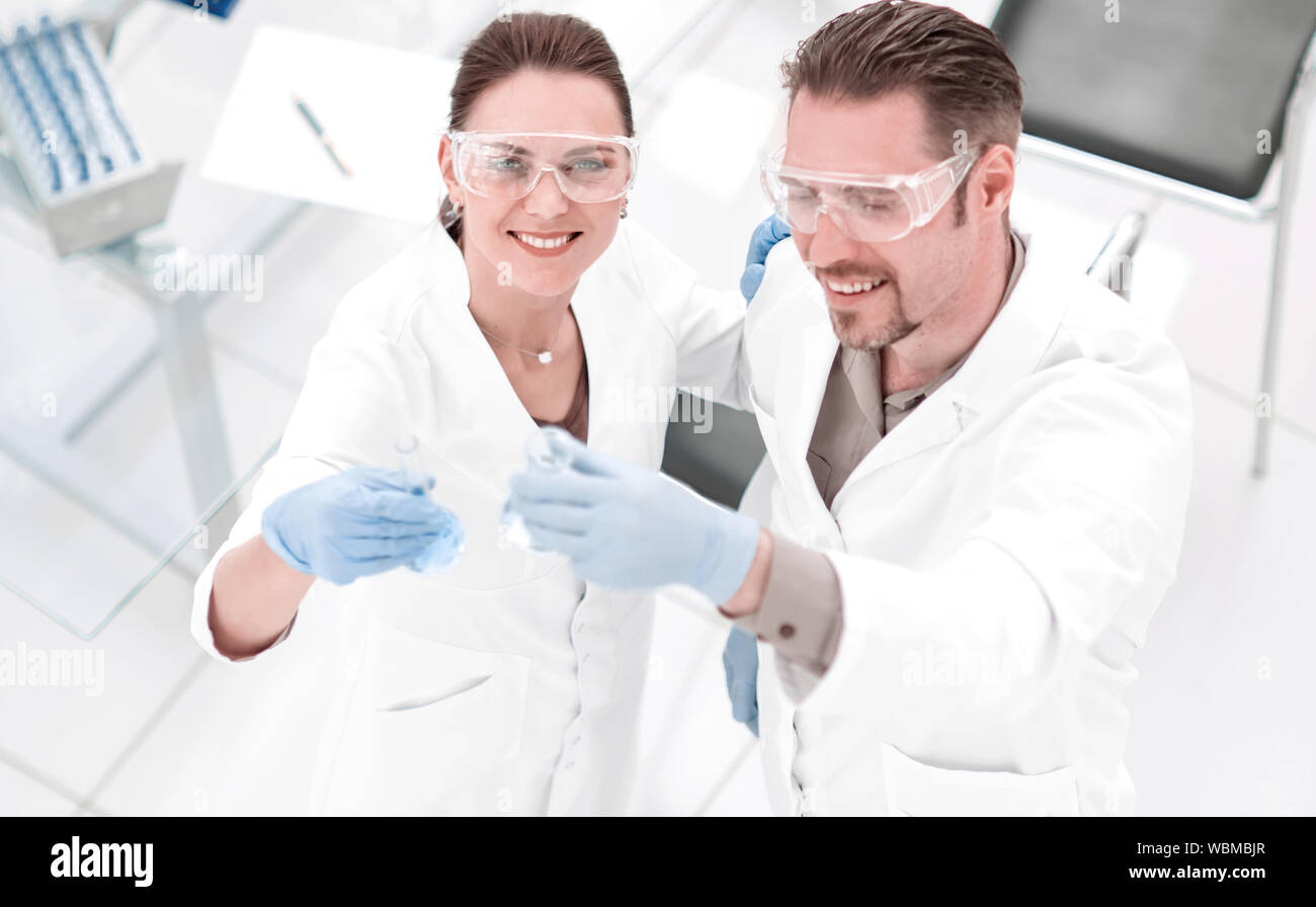 top view.happy scientists standing in the laboratory Stock Photo - Alamy