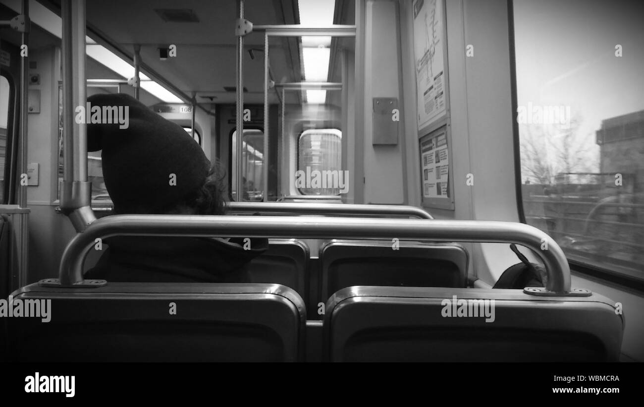 Man sitting chair and rear view Black and White Stock Photos & Images ...